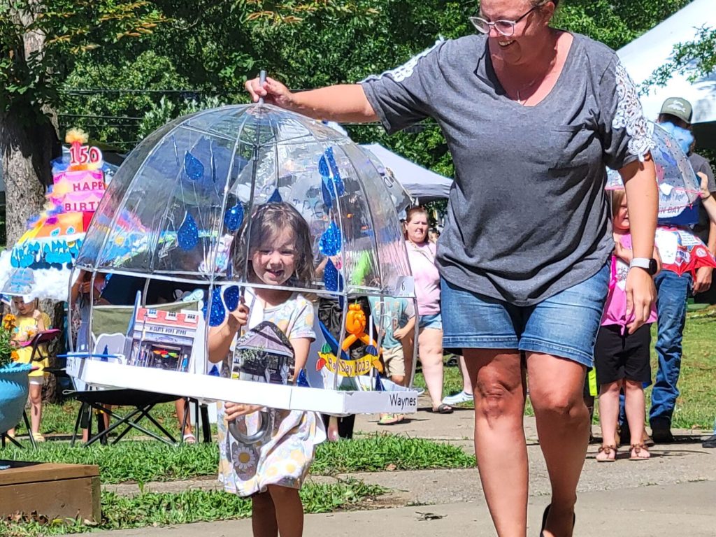 Festival-goers drenched in fun at 150th Rain Day - Herald-Standard